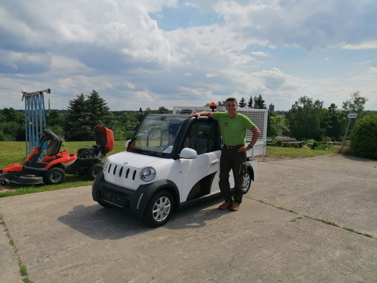 Electric gardening and landscaping vehicles